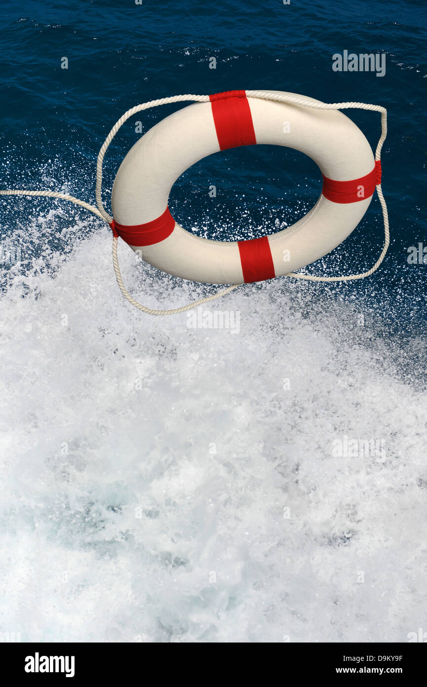 Life preserver thrown into splashing water Stock Photo - Alamy