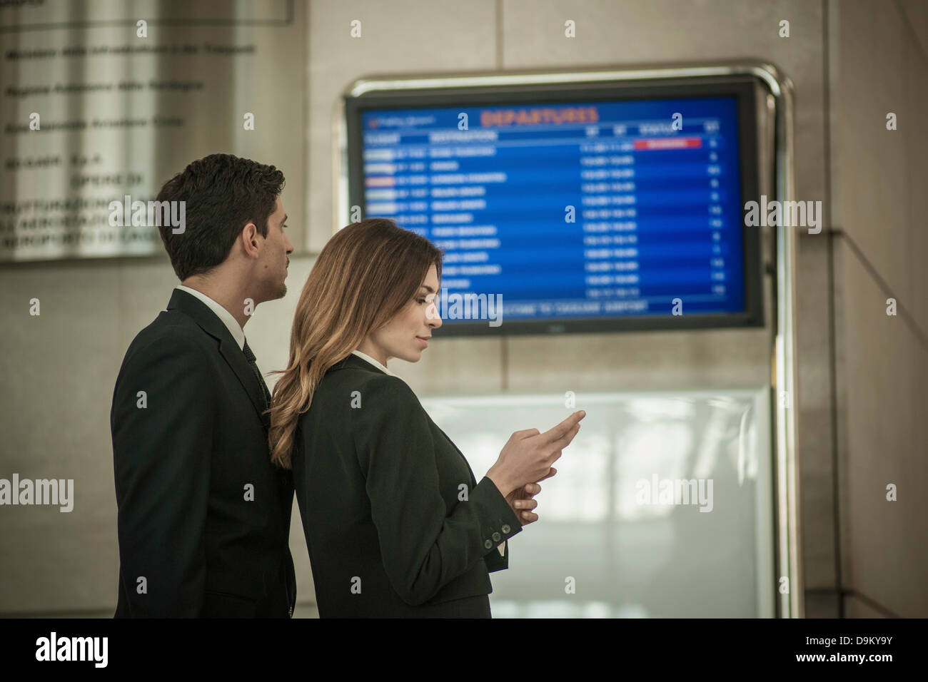 Airport board people departures italy hi-res stock photography and ...