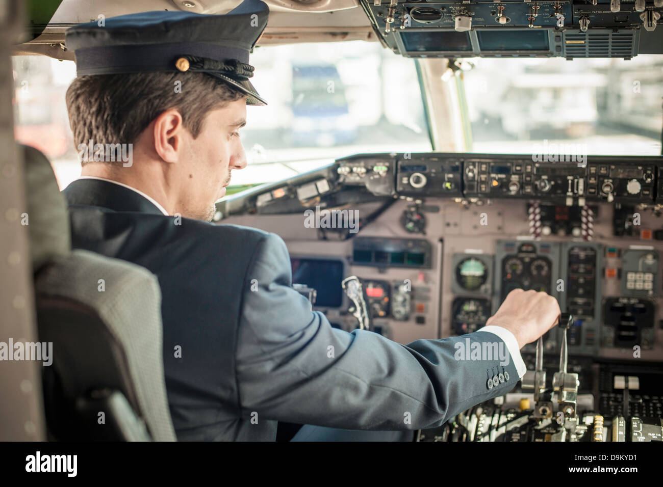 Male pilot in aeroplane cockpit Stock Photo - Alamy