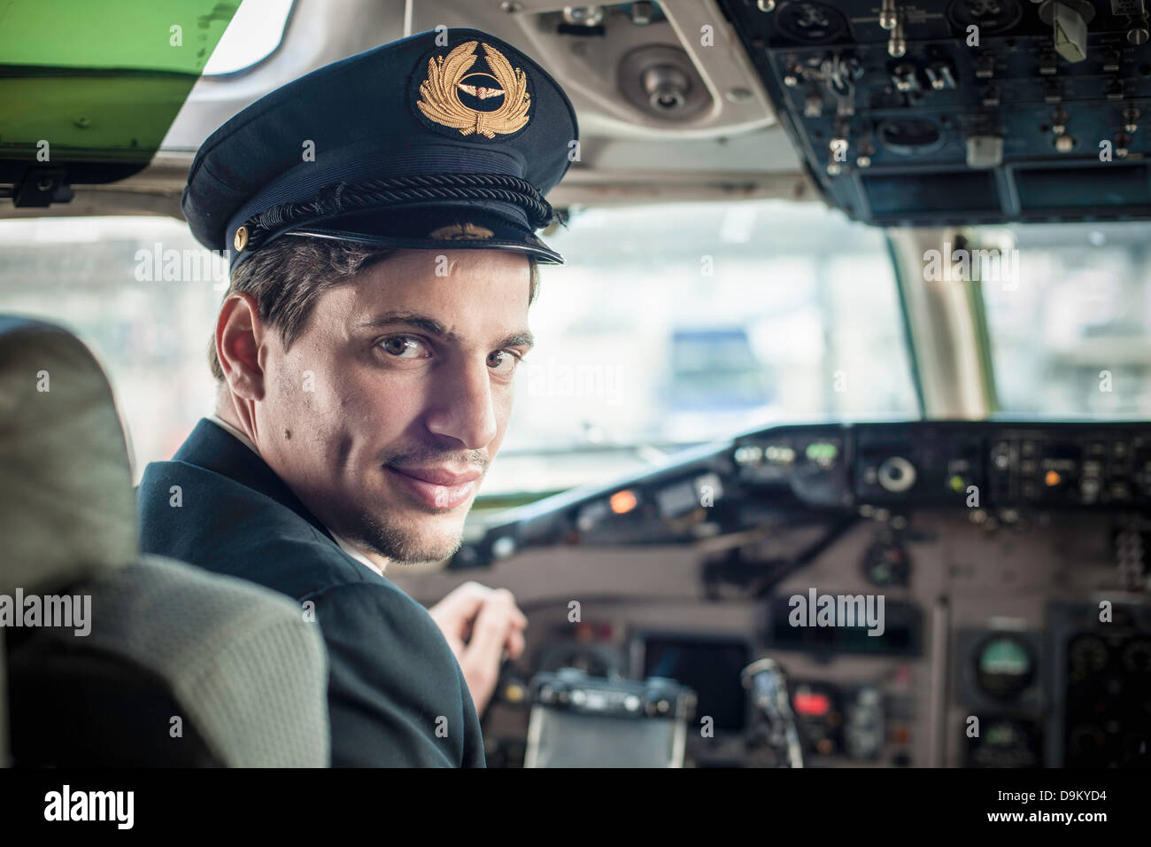Male pilot in aeroplane cockpit Stock Photo - Alamy