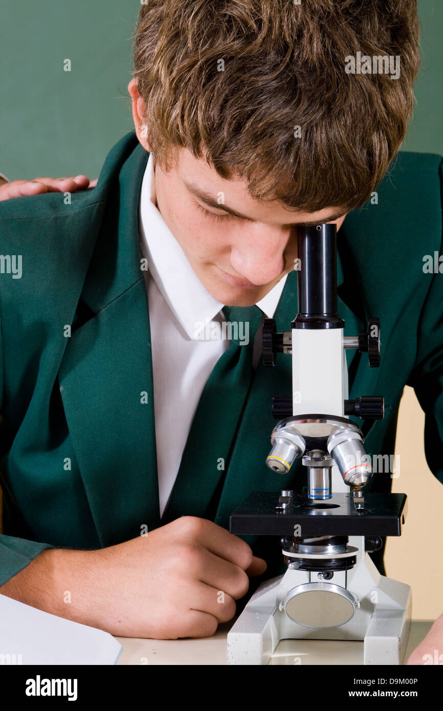 high school student using microscope Stock Photo - Alamy