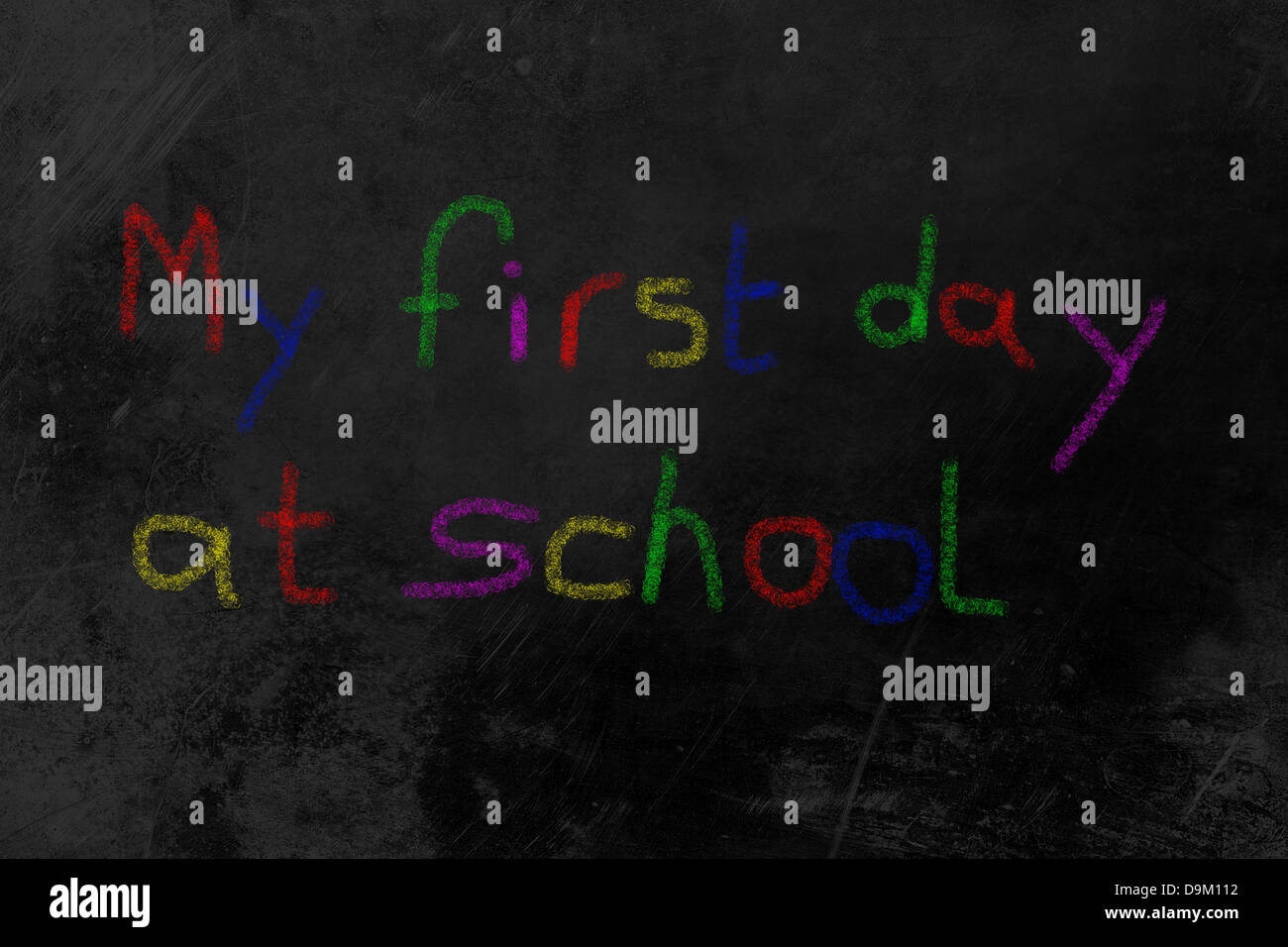 my 1st day at school with colored chalk on a black board Stock Photo ...