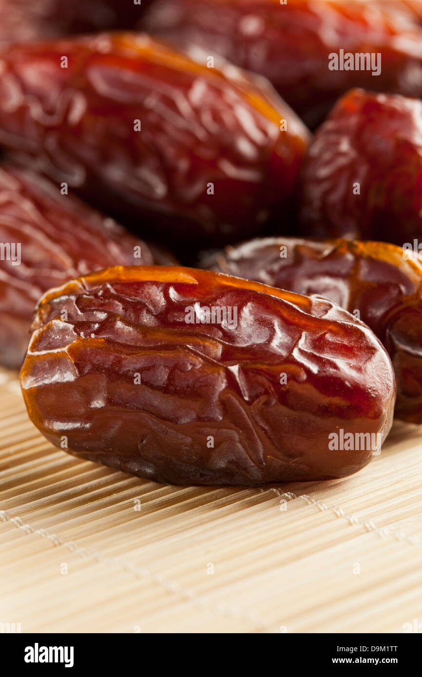 Fresh Organic Raw Brown Date Fruit against a background Stock Photo - Alamy