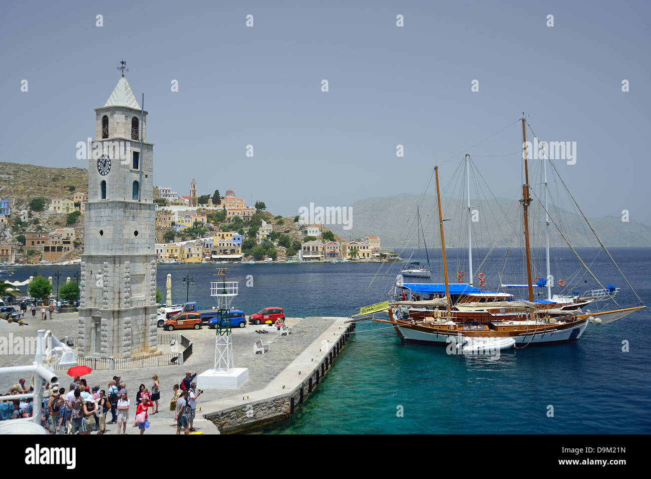 Clock tower on waterfront, Symi Harbour, Symi (Simi), Rhodes (Rodos ...