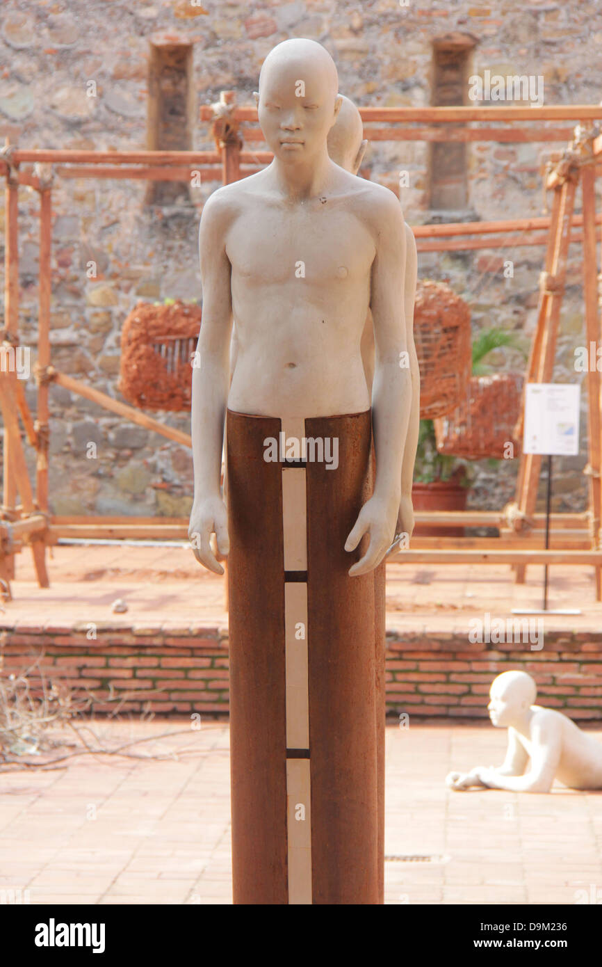 Bald human figure statues Stock Photo - Alamy