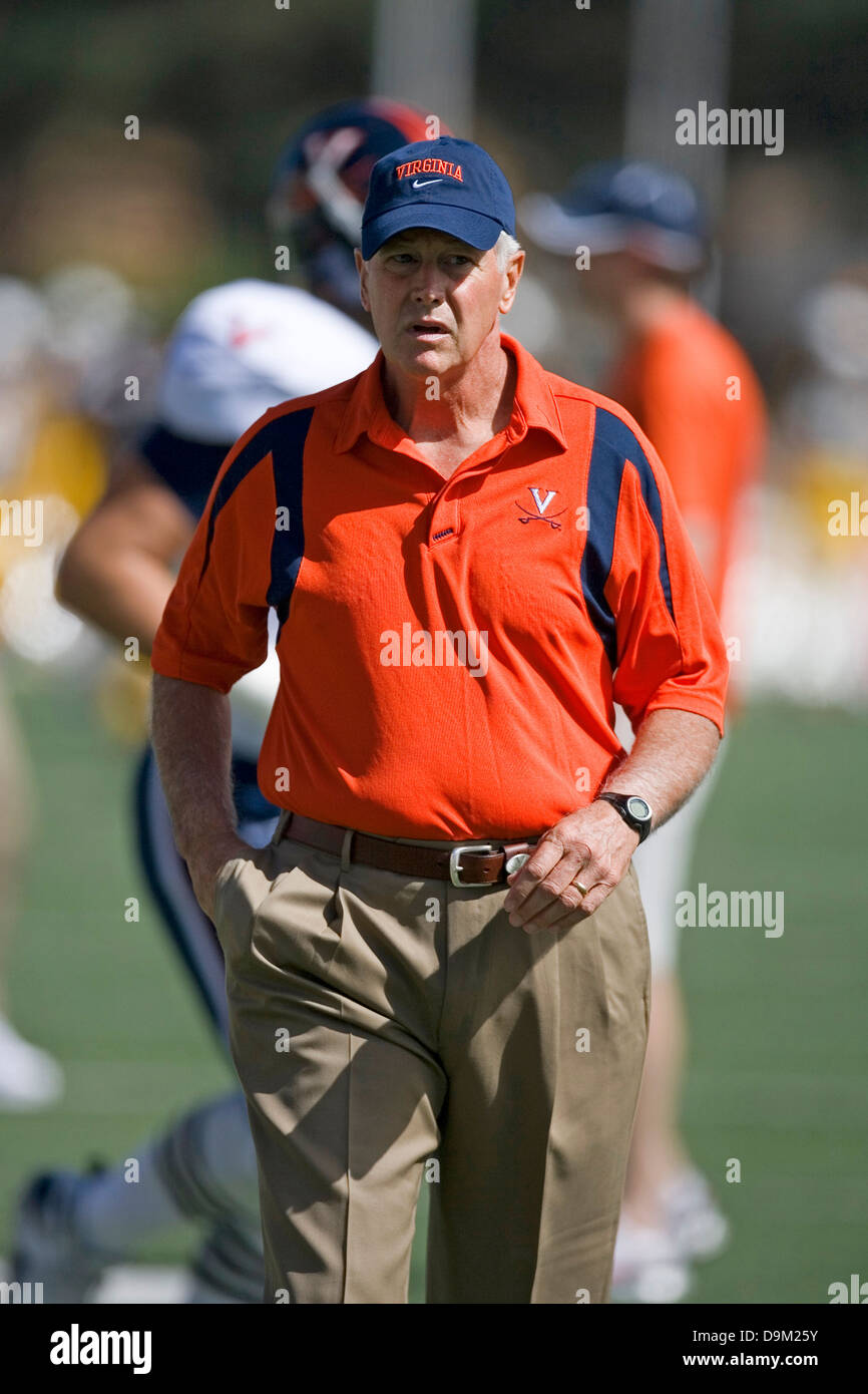 Virginia head coach Al Groh stands on the field. The Wyoming Cowboys ...