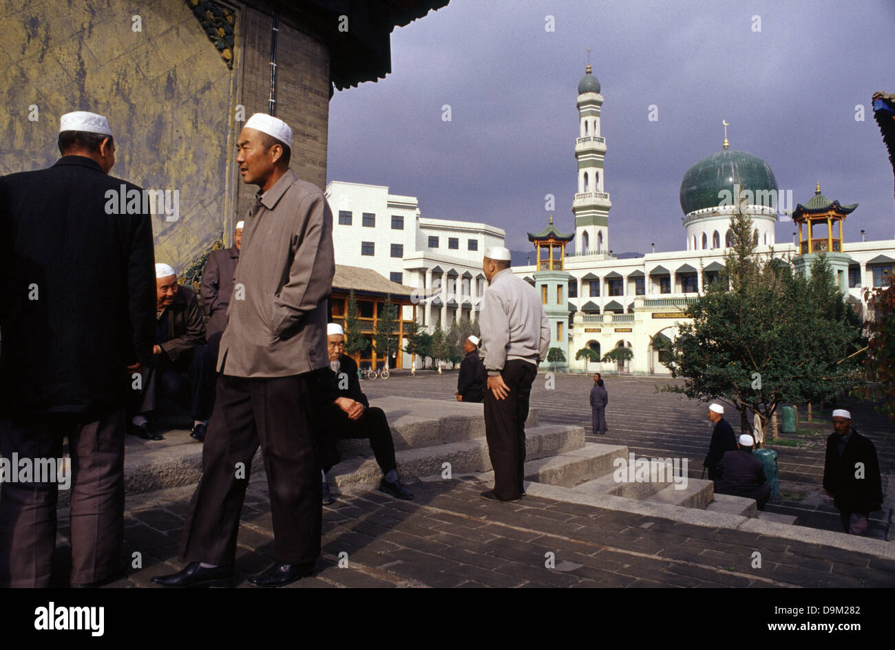 Hui Muslims men in the courtyard of Dongguan Grand Mosque originally ...