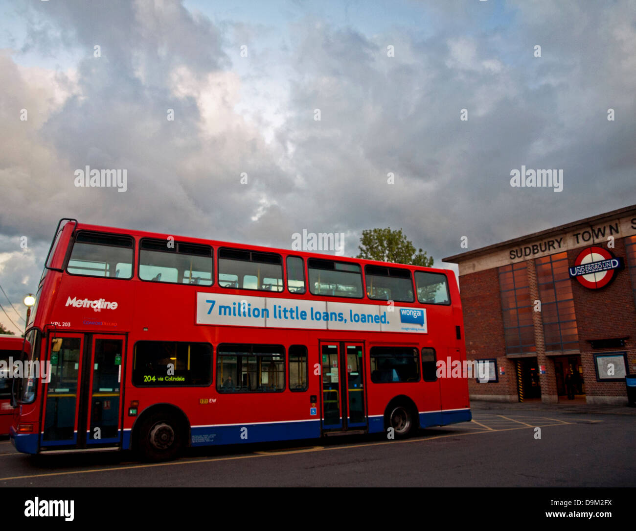 Double-decker bus parked at Sudbury Town Station designed by Charles ...