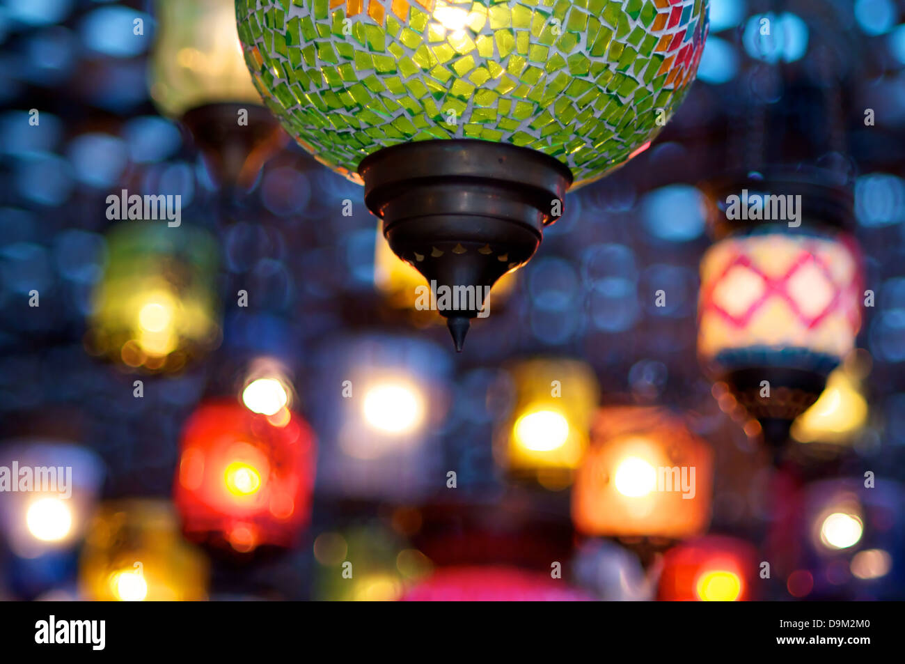 Colorful traditional lamps lit up Stock Photo - Alamy