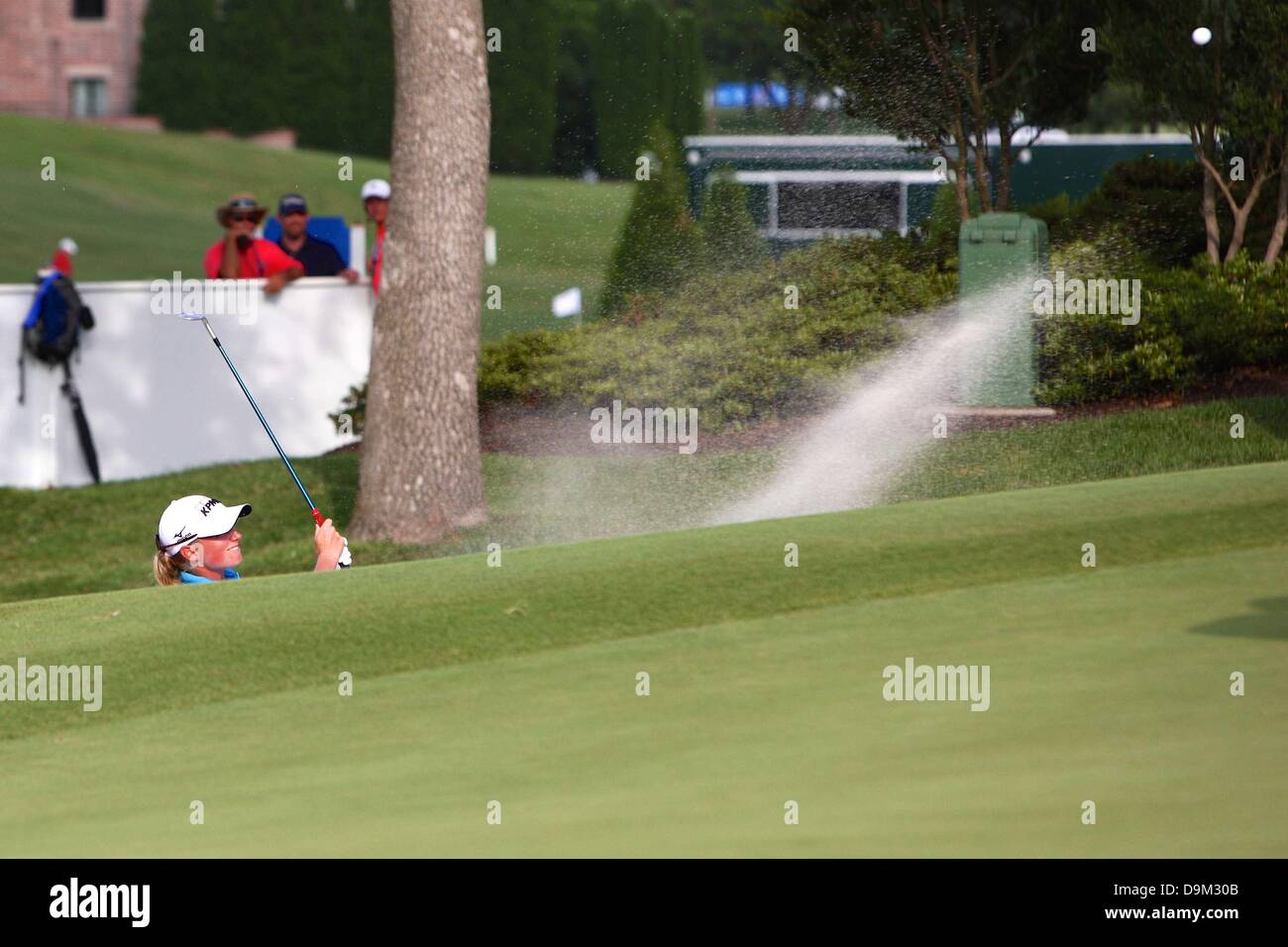 Jun 21, 2013: Stacy Lewis hits out of the bunker in front of the 18th ...