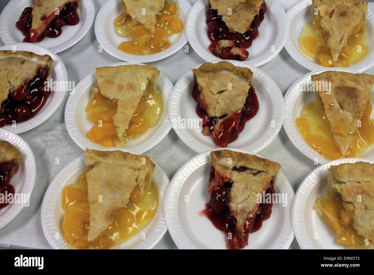 homemade fruit cherry peach pie slices plates Stock Photo - Alamy