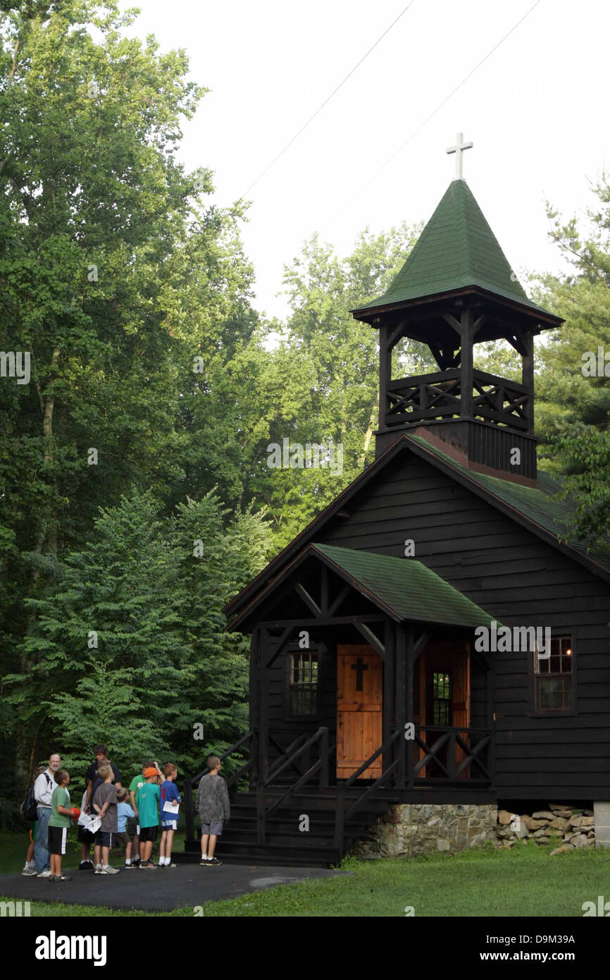 Christian, church chapel in the woods forest camp with people in group ...