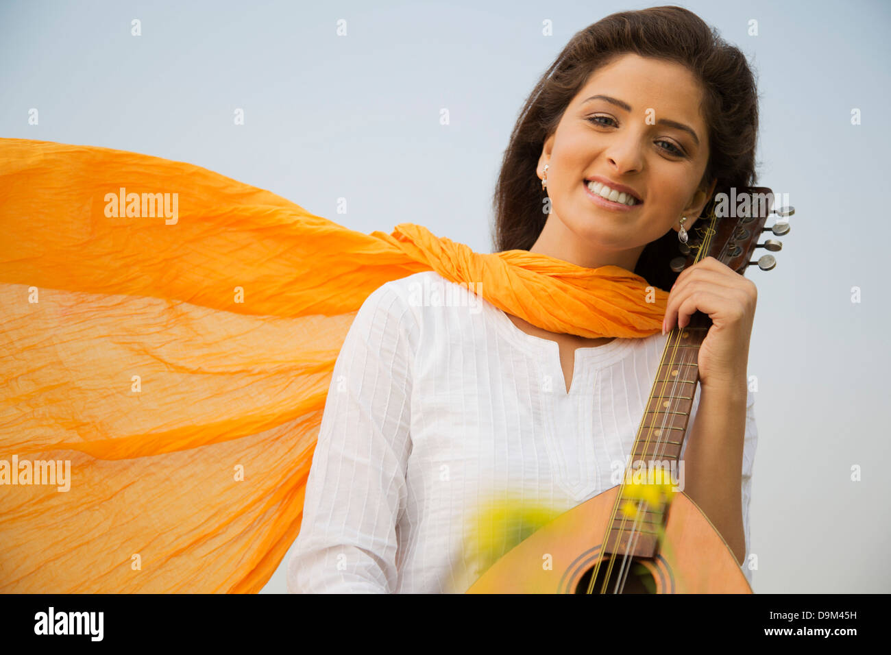 Woman playing mandolin hi-res stock photography and images - Alamy