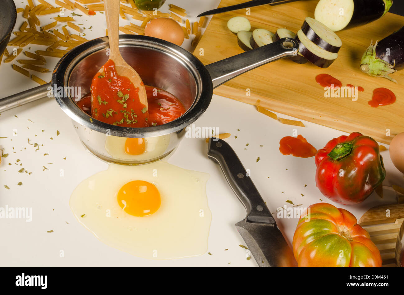Stained and spotty kitchen table left in a mess Stock Photo - Alamy