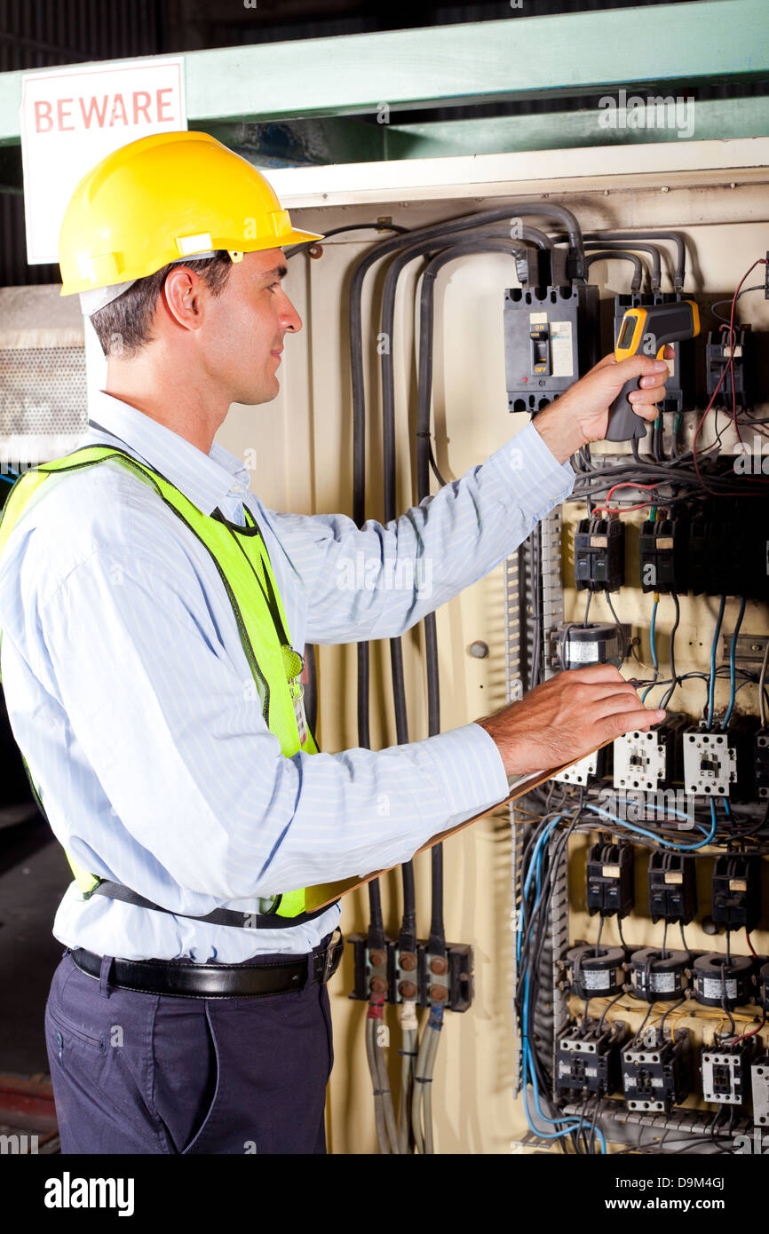Electrical worker checking monitoring hi-res stock photography and ...