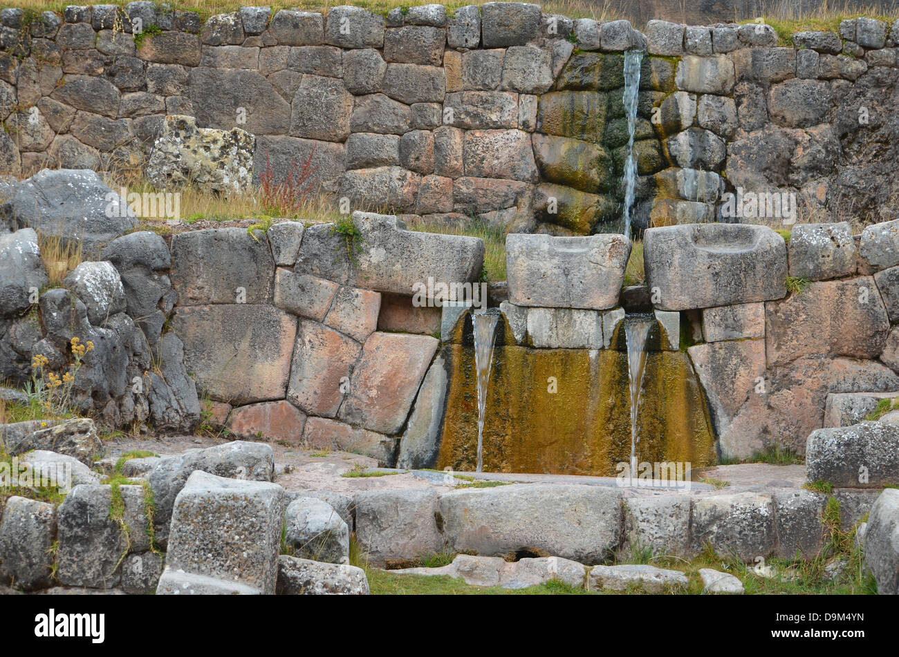 Inca Stone water channels running through the Tambomachay ...