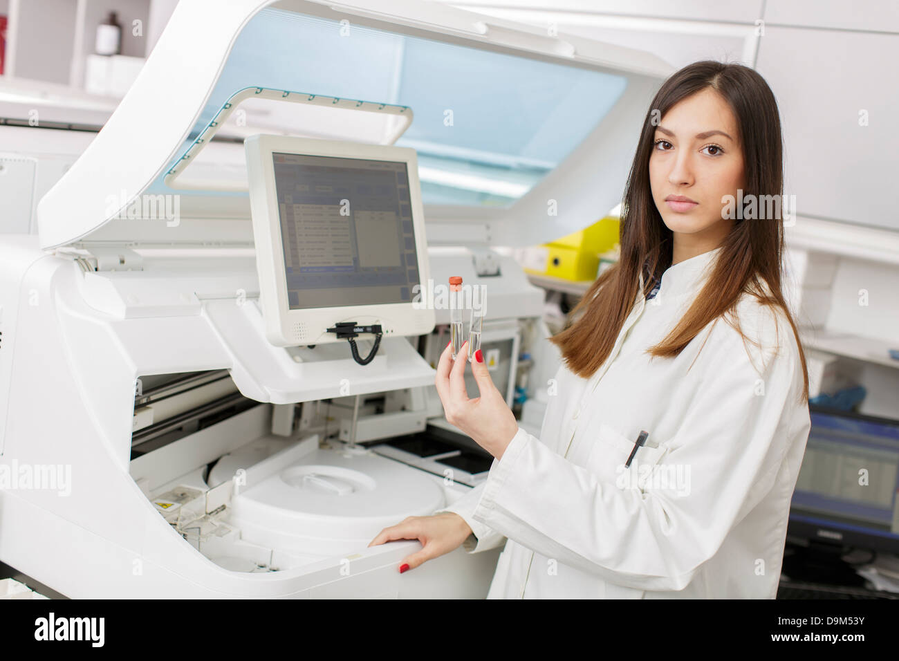 Young woman in the modern medical laboratory Stock Photo - Alamy