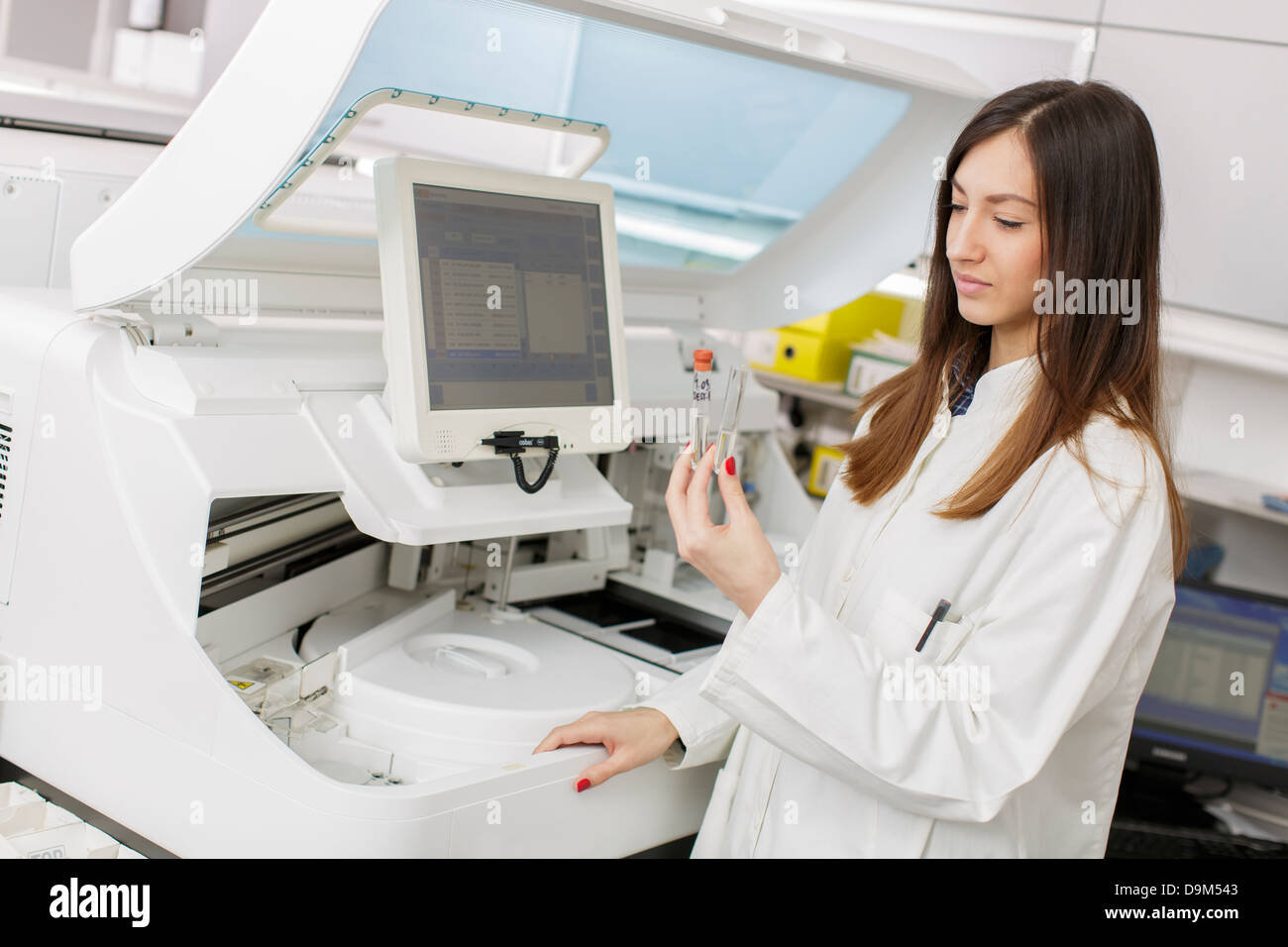Young woman in the modern medical laboratory Stock Photo - Alamy