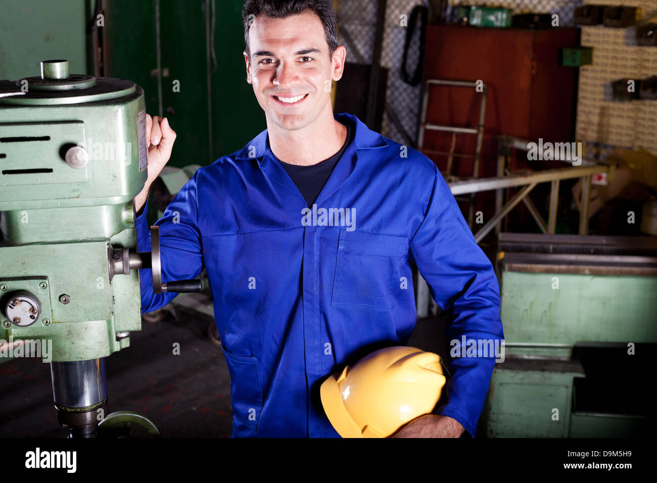 happy industrial craftsman portrait next to machine tool Stock Photo ...