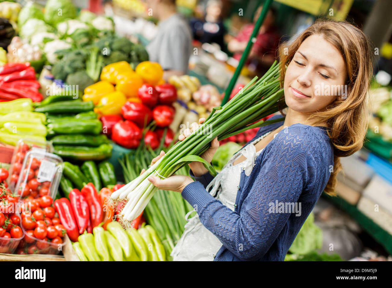 Young woman at the market Stock Photo - Alamy