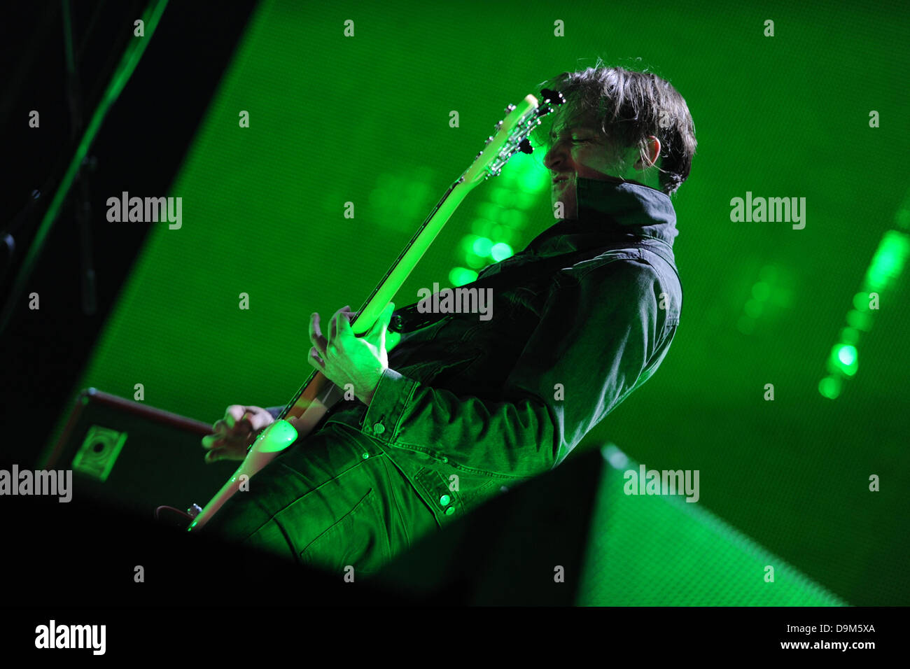 Neuhausen ob Eck, Germany. 21st June, 2013. The bass guitarist of the ...