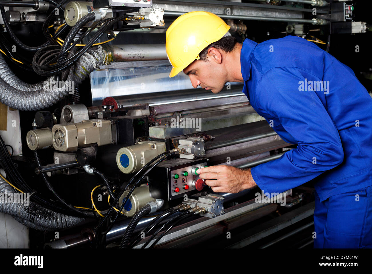 male printer running modern industrial printing machine Stock Photo - Alamy