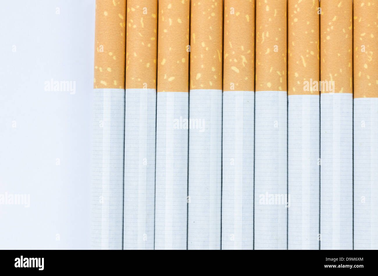 cigarettes with a brown filter macro shot in white background Stock ...