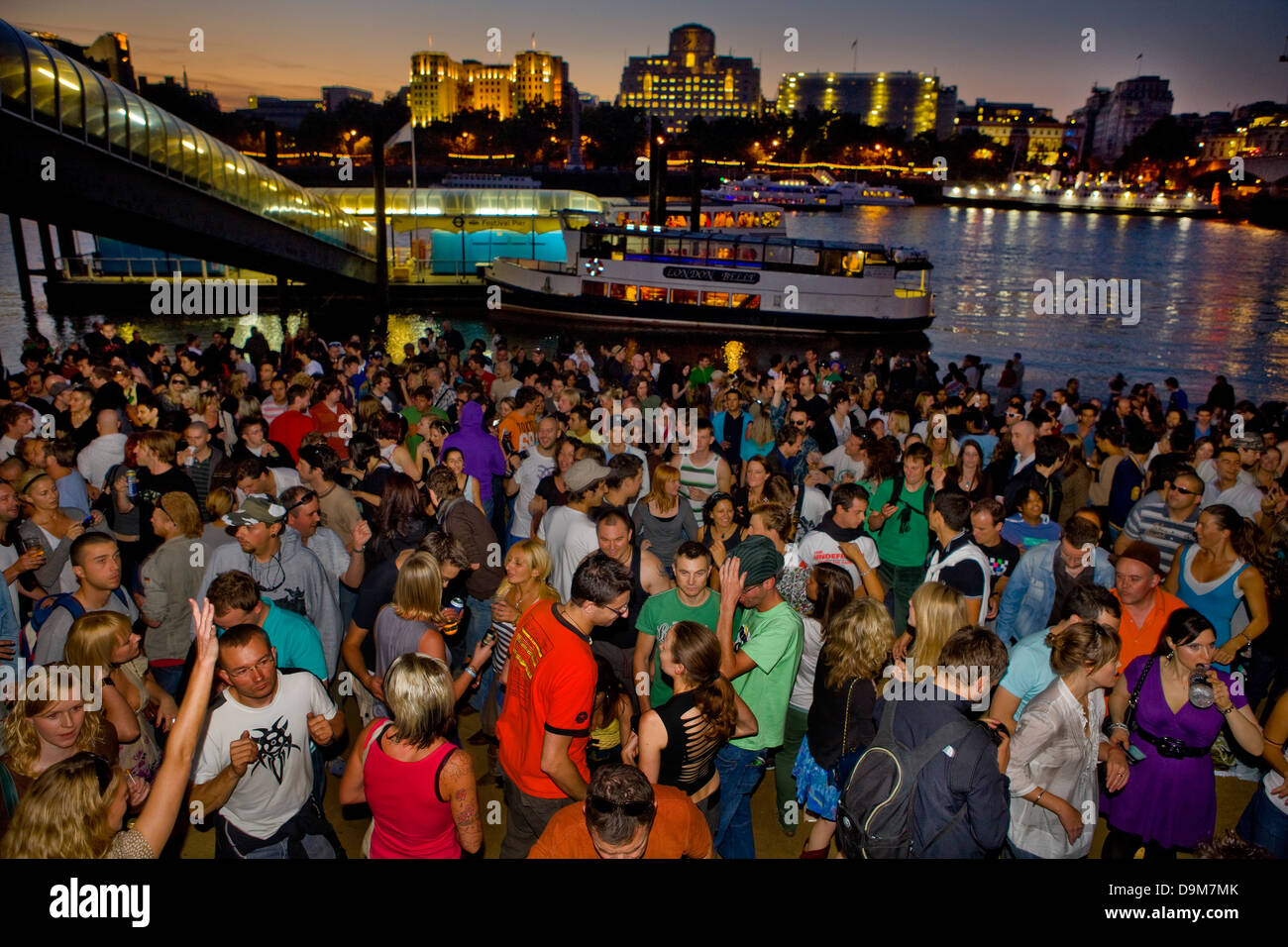 Rave on the Thames beach during the Thames Festival, London, UK Stock ...