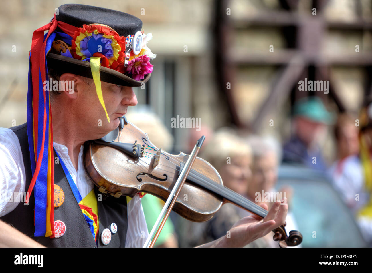 Fiddle player accompanying Morris Dancers at the Rushcart Ceremony on ...