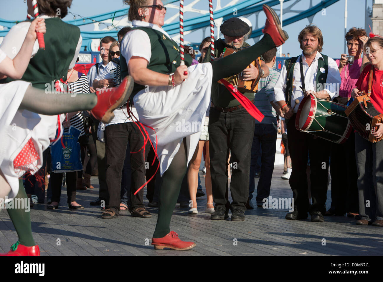 Thames Festival 2009. Women clog dancers performing in front of Tower ...