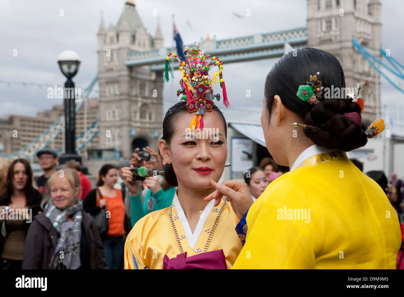 Thames Festival 2009. Korean Traditional dancers mixing with the London ...