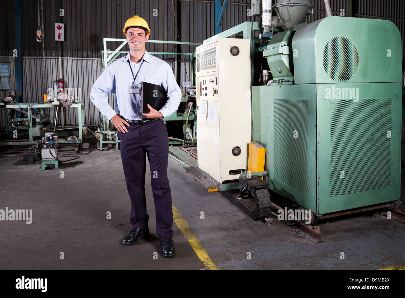 full length portrait of a factory manager Stock Photo - Alamy