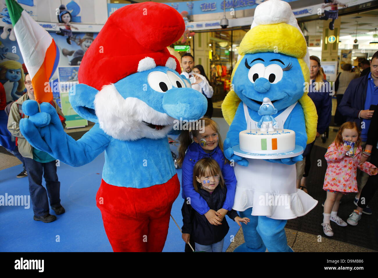 Dublin, Ireland. 22nd June 2013. Two actors dressed as Papa Smurf (L ...