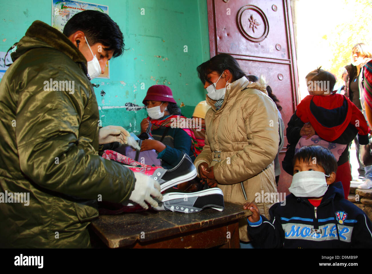 La Paz, Bolivia. 22nd June 2013. A woman and her son have their ...