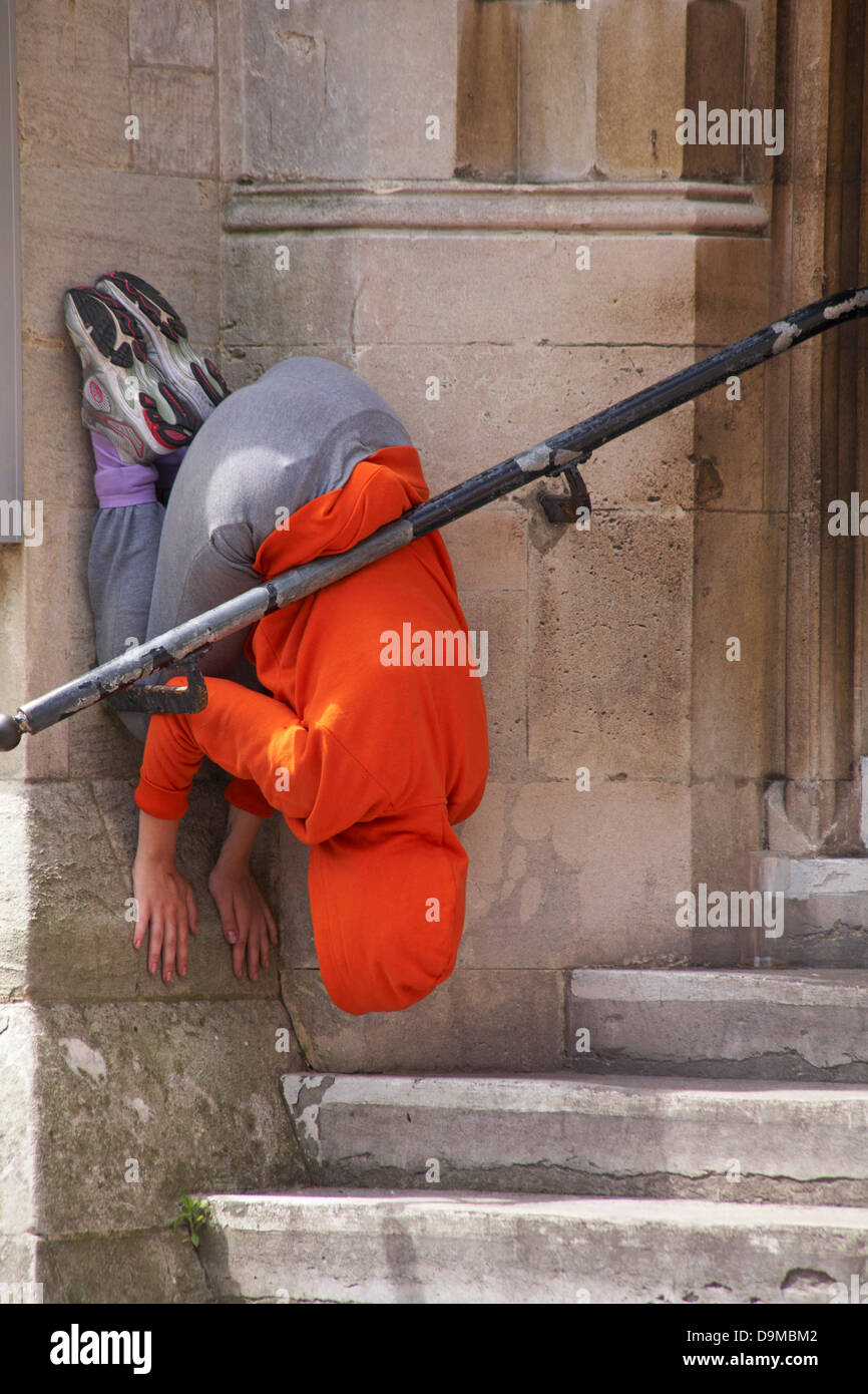 Person stuck between railings hi-res stock photography and images - Alamy