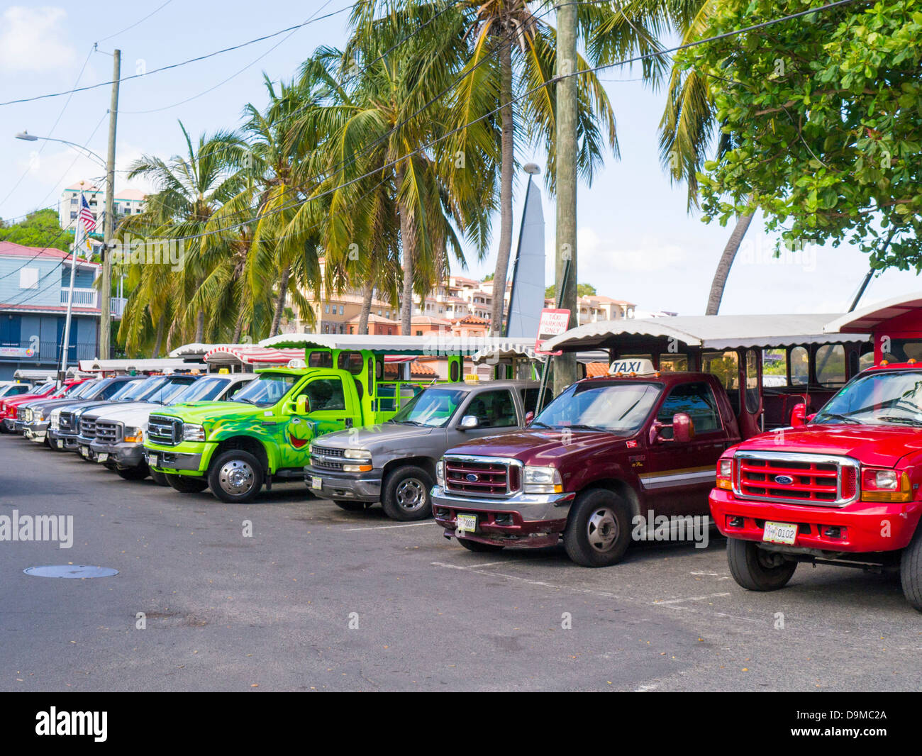 Taxis waiting for tourists in Cruz Bay on the Caribbean Island of St ...