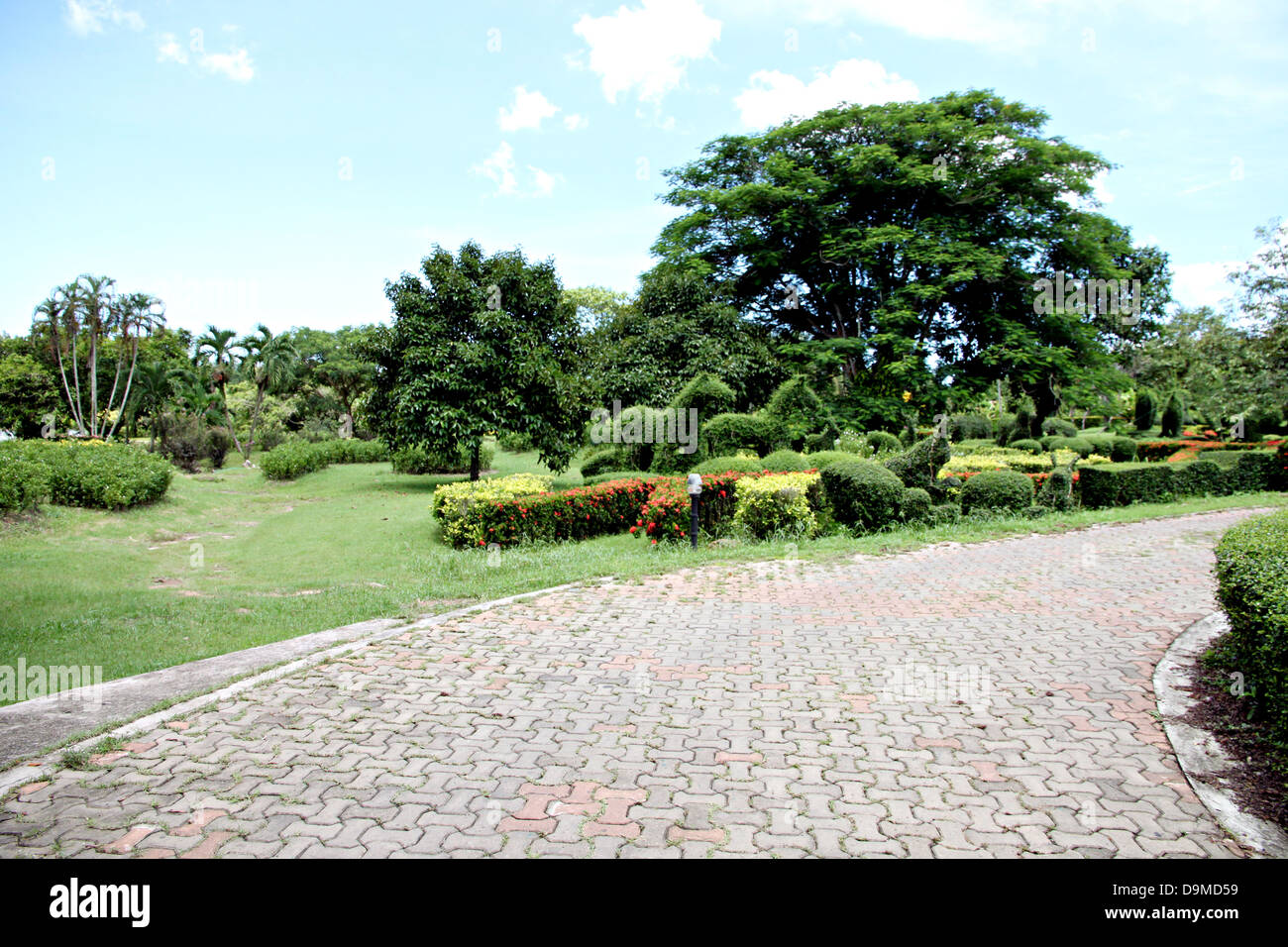 The Walk in Park and Pathway paved with bricks Stock Photo - Alamy