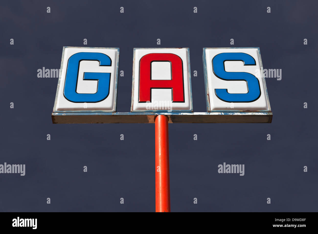Old isolated gas sign with desert thunderstorm sky Stock Photo - Alamy