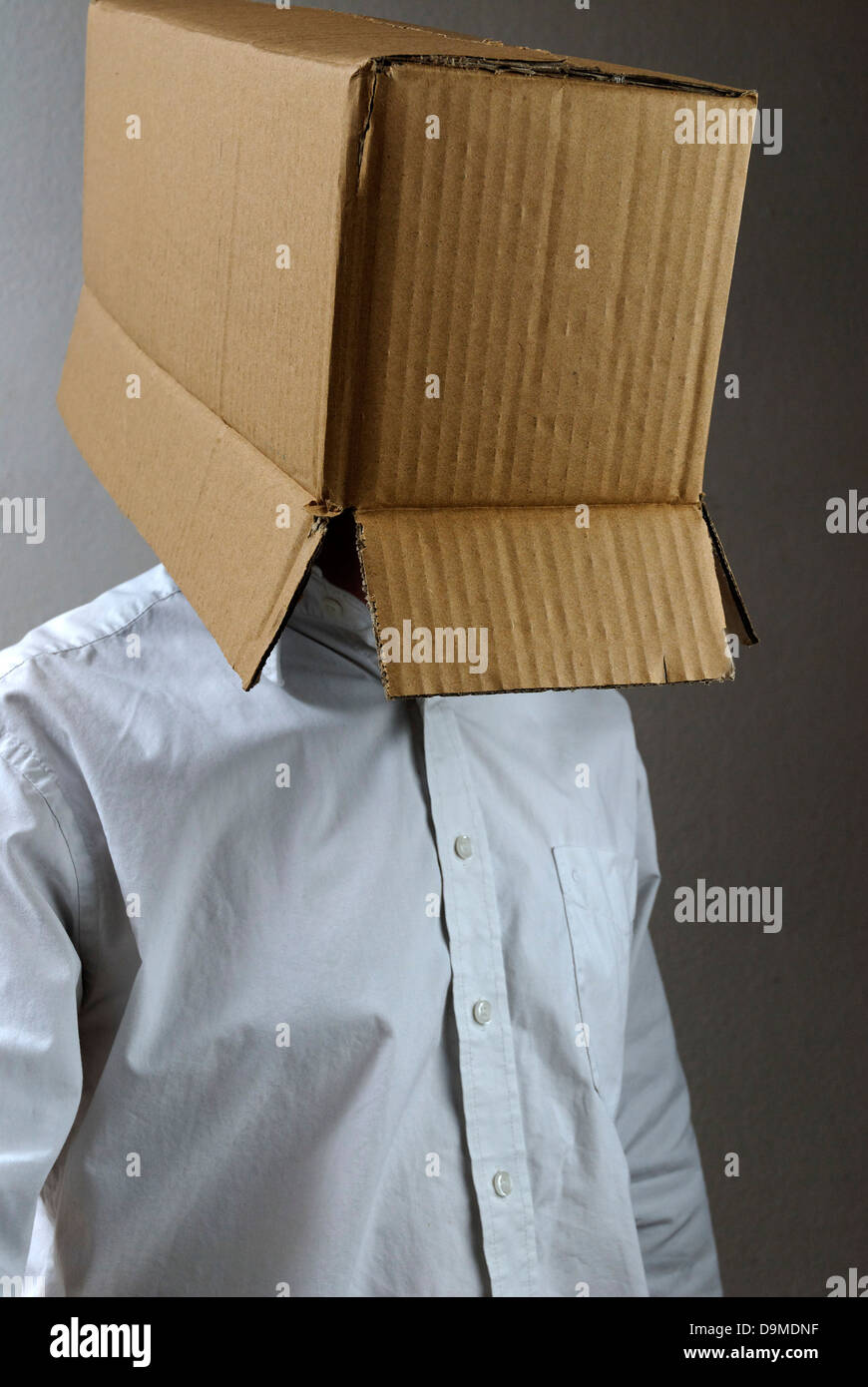 Man with box on head Stock Photo - Alamy
