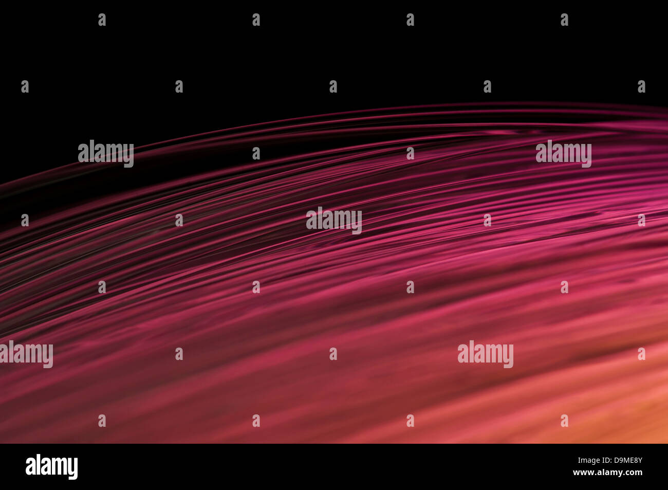 Red light transmitted along fibre optic stands Stock Photo - Alamy