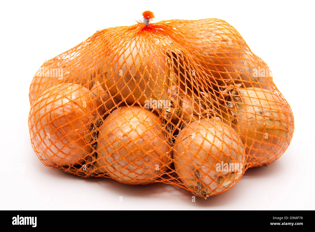 Onions in the net Stock Photo - Alamy
