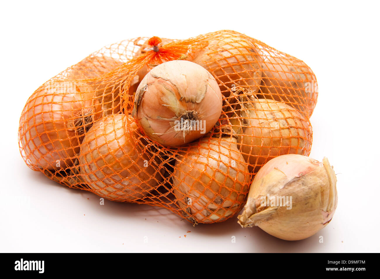 Onions in the net Stock Photo - Alamy