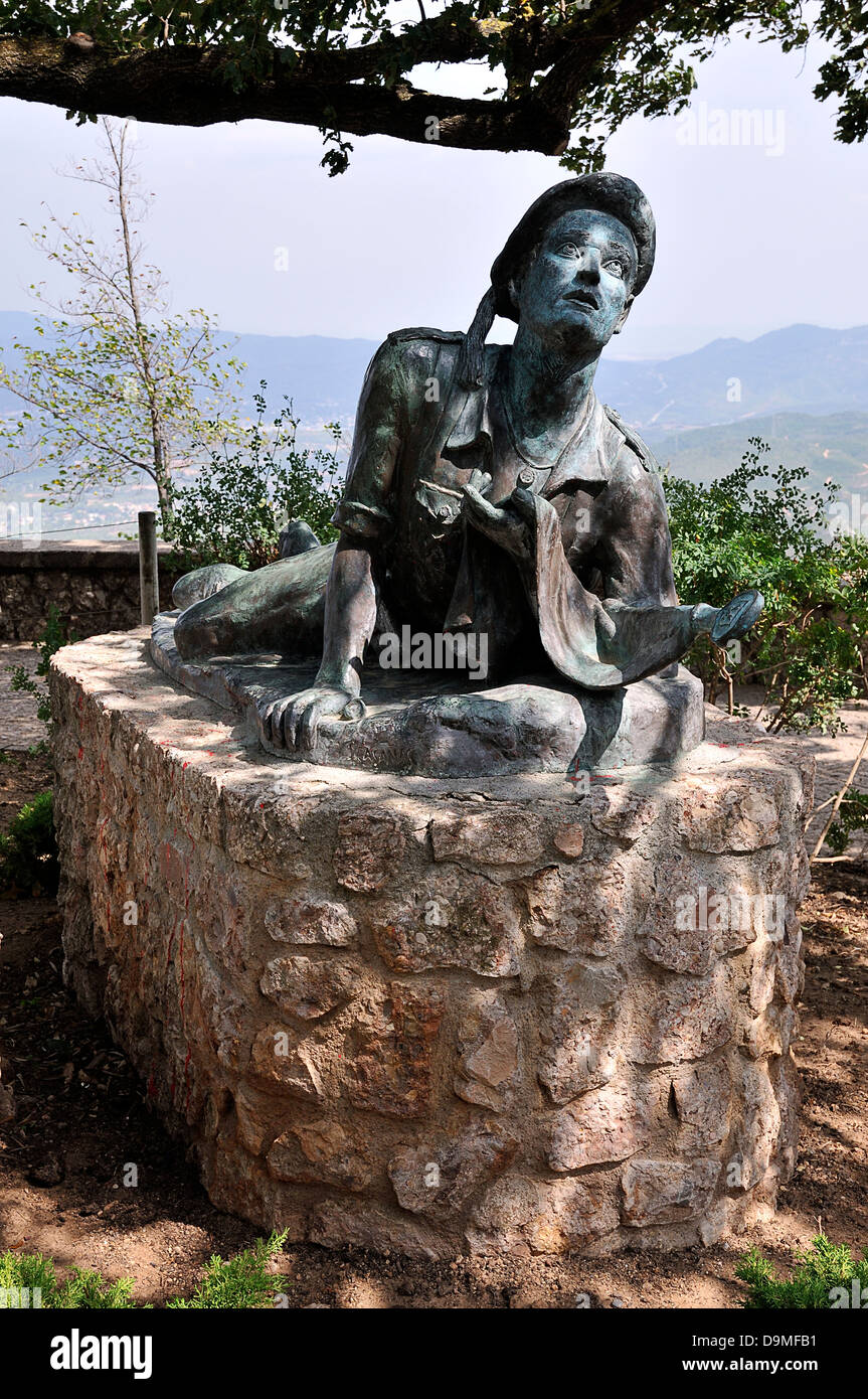 man lying monument you can visit in Montserrat Stock Photo - Alamy