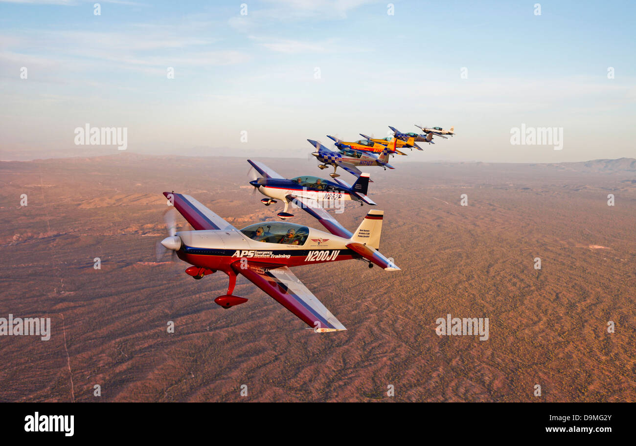 Extra 300 aerobatic aircraft fly in formation during APS training in ...