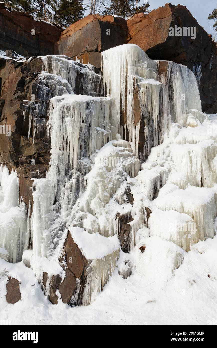 Ice covered rocky outcrop on the North Shore of Lake Superior ...