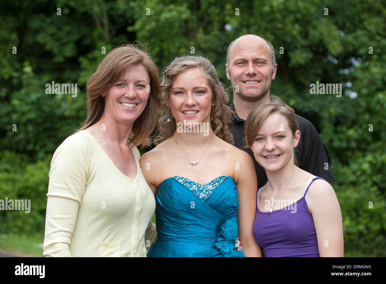 Family portrait parents and two girls Stock Photo: 57615185 - Alamy
