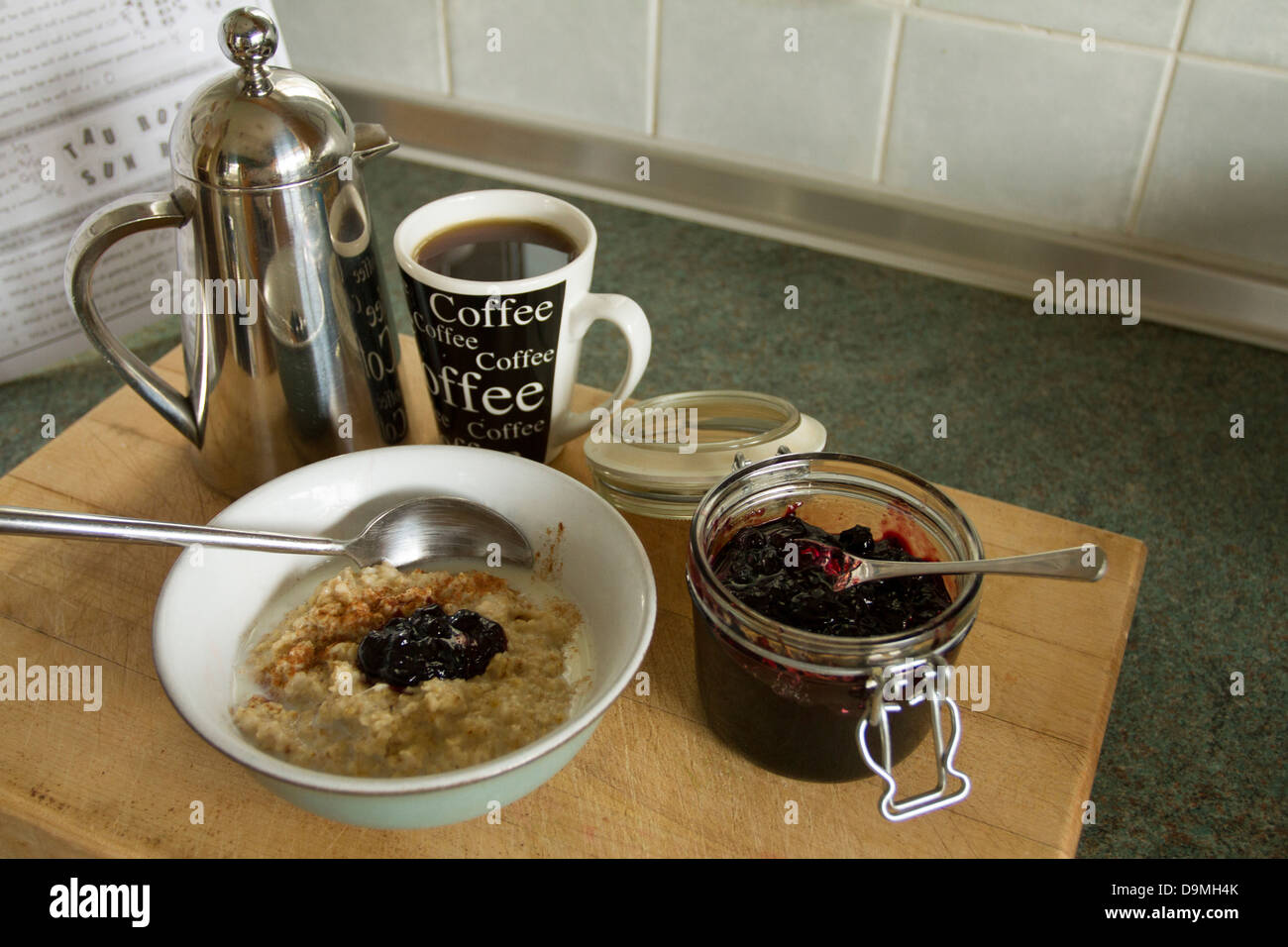 breakfast board with porridge and coffee and coffee pot Stock Photo - Alamy