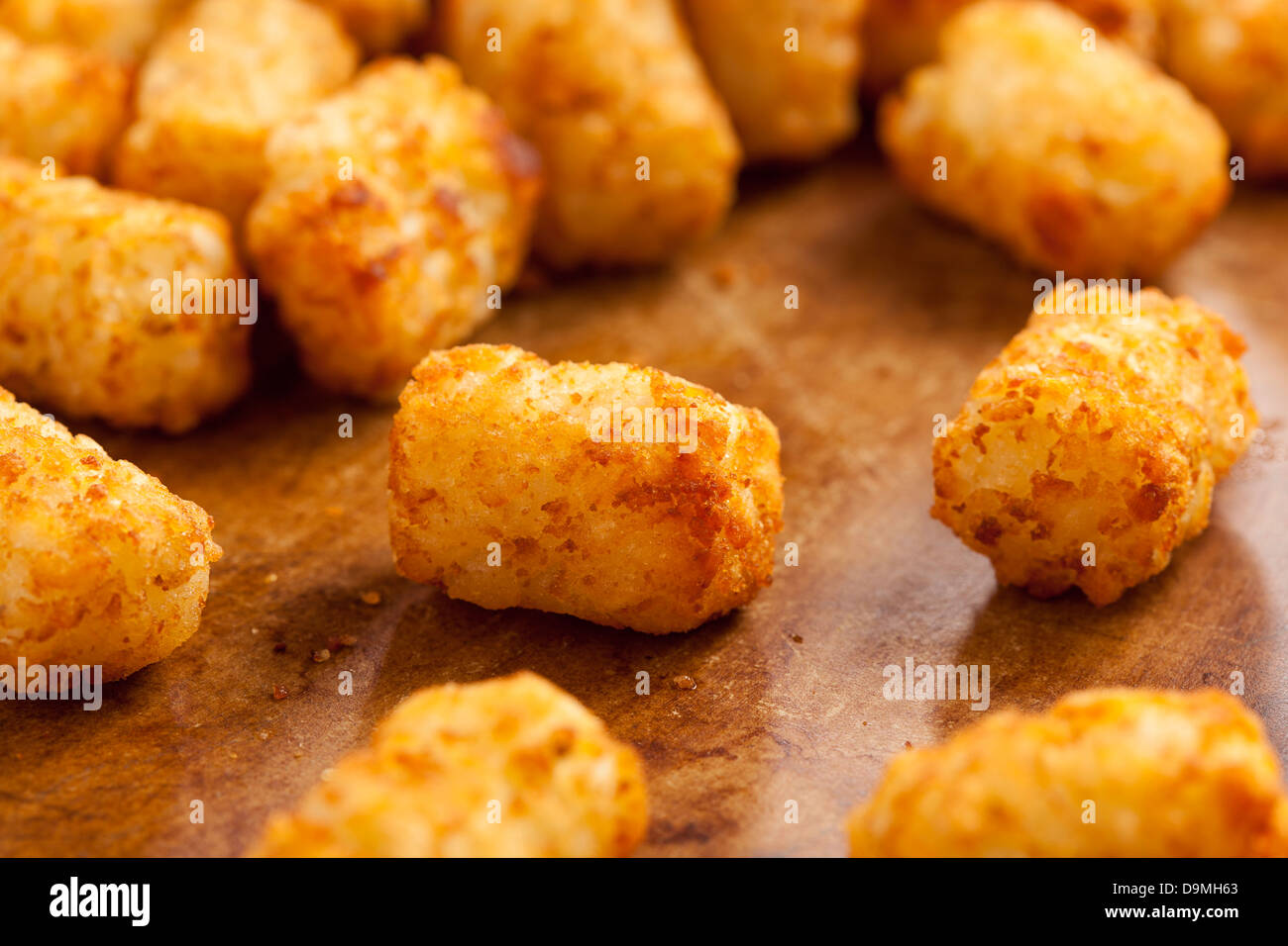 Organic Fried Tater Tots made from fried potato Stock Photo - Alamy