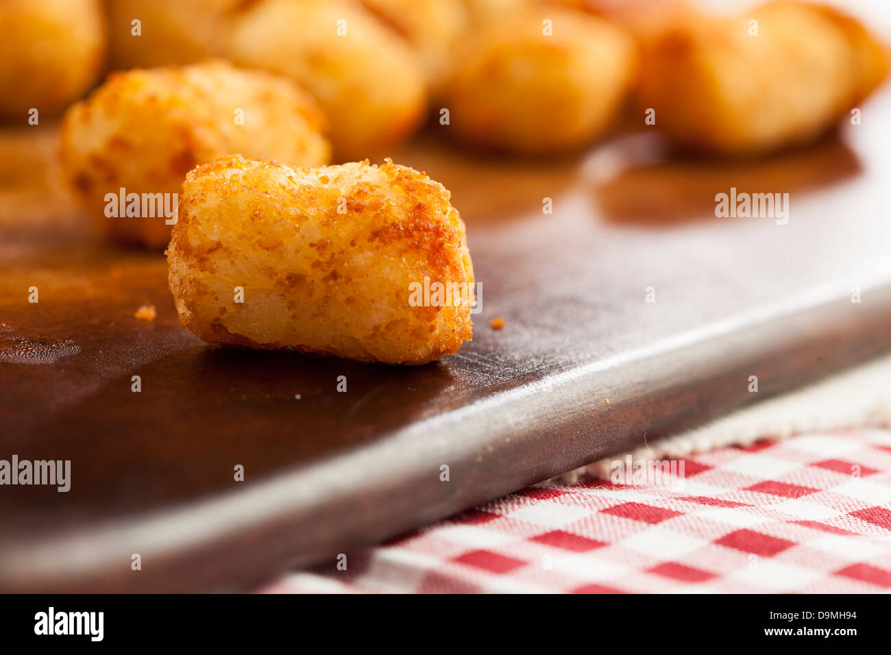 Organic Fried Tater Tots made from fried potato Stock Photo - Alamy