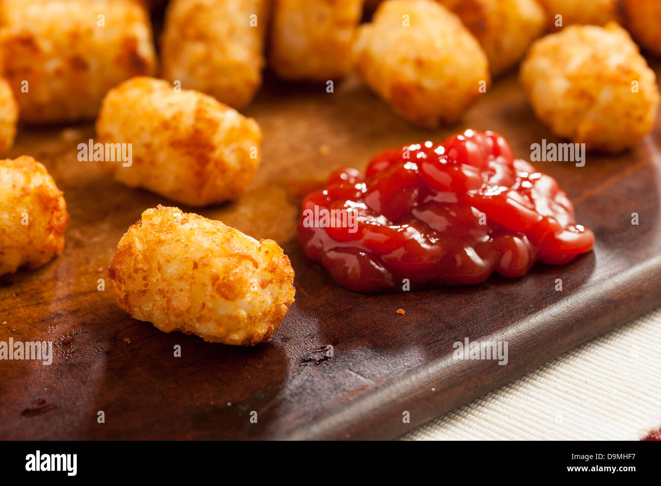 Organic Fried Tater Tots made from fried potato Stock Photo - Alamy